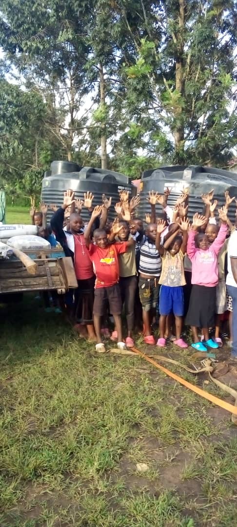 Water Tanks for Two Schools | Children Waiting Everywhere
