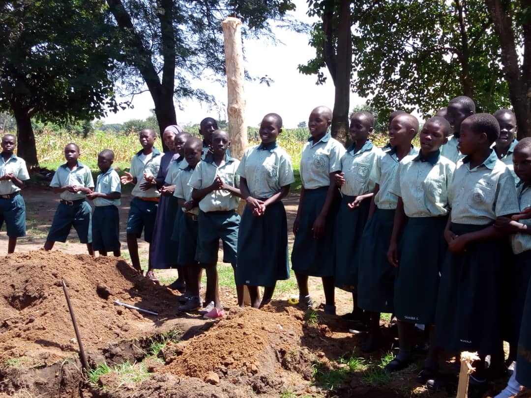 Breaking ground for new classroom | Children Waiting Everywhere